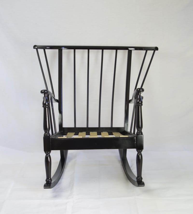 A black stained mid-century Joynson Holland wooden stick back cottage