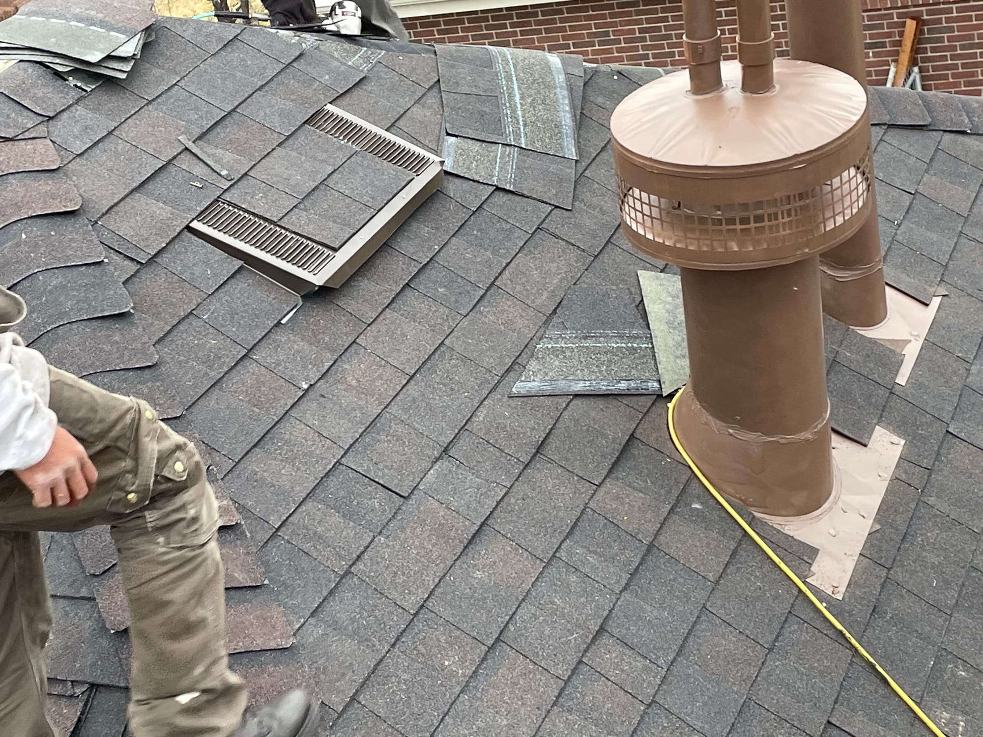 Shingle repair during the new roof process - HC Storm Contractors