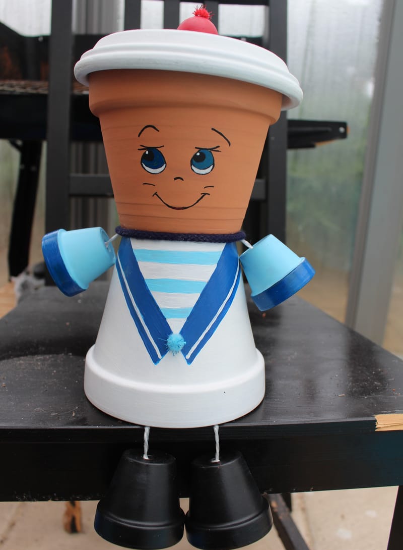 Personnage En Pots De Terre Cuite