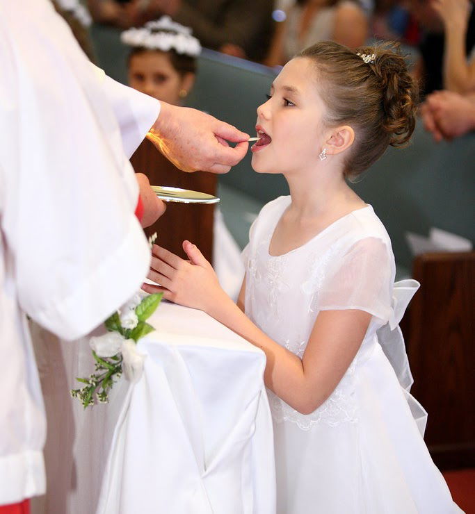 First Communion - Holy Cross Family of Parishes