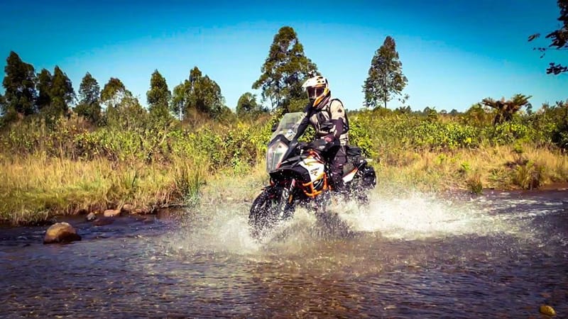 "Conquer the Elements: How to Ride Through Water on Your Adventure ...