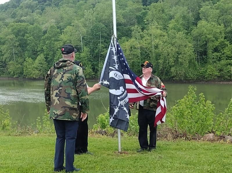 Raising the Flags - Riverfront Park Associates